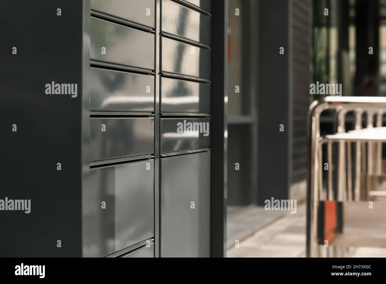 Automated self service post terminal machine Stock Photo - Alamy