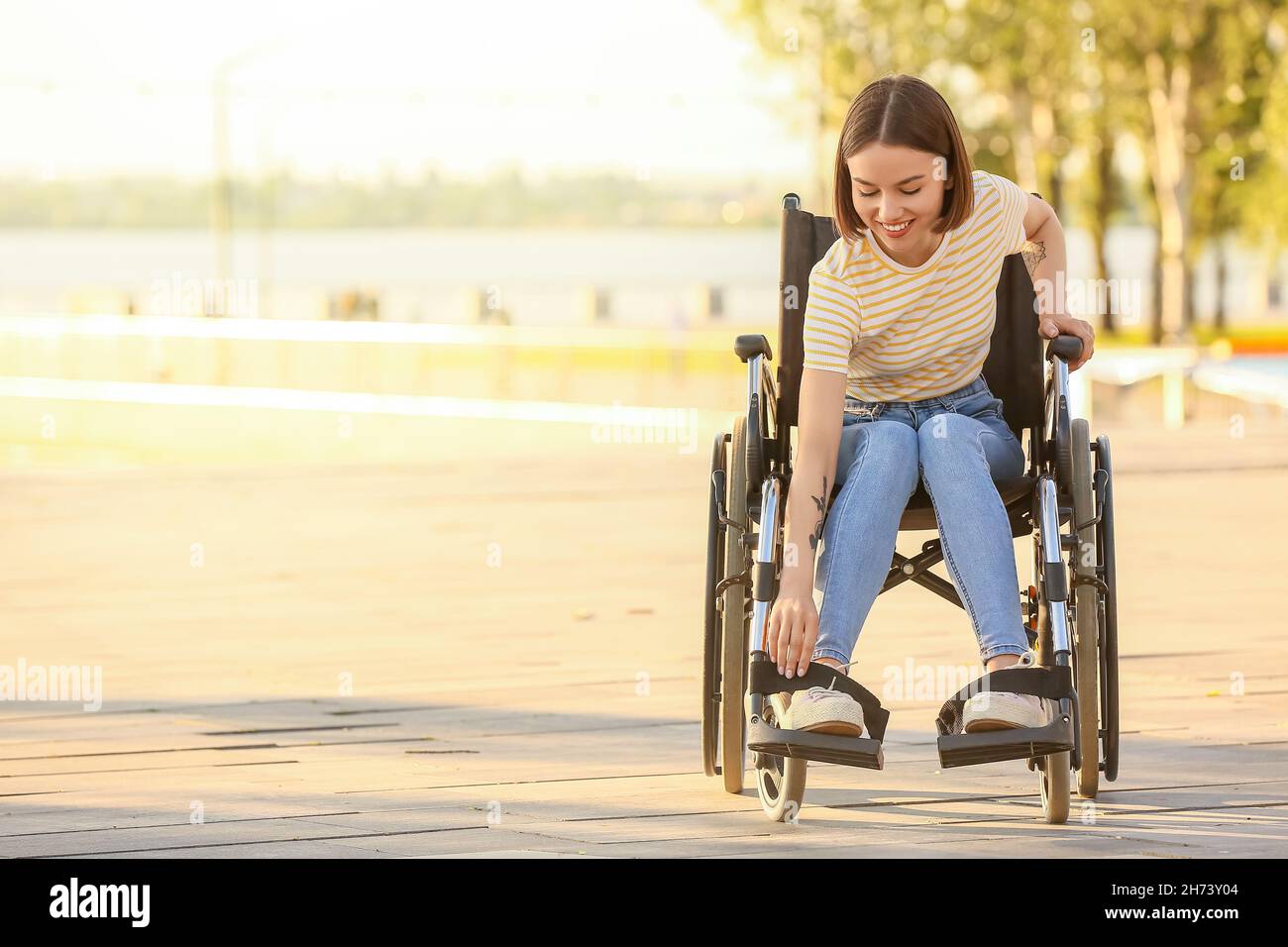 Young woman with physical disability outdoors Stock Photo - Alamy