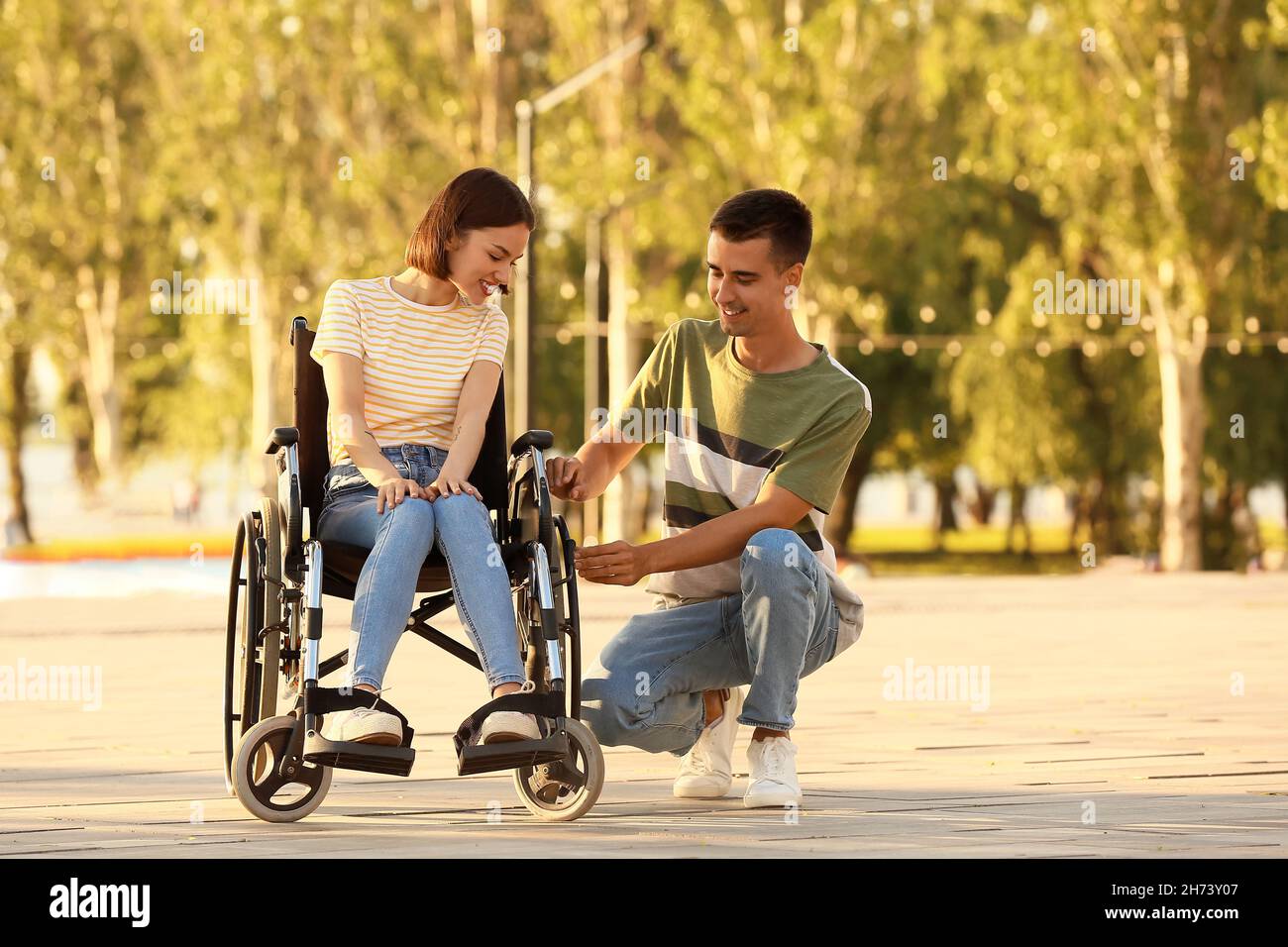 Young woman with physical disability and her husband outdoors Stock ...