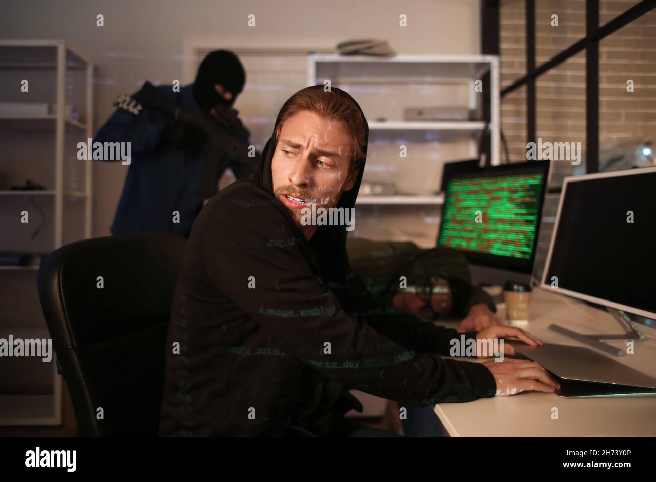 Assault team arresting hackers in dark room Stock Photo - Alamy