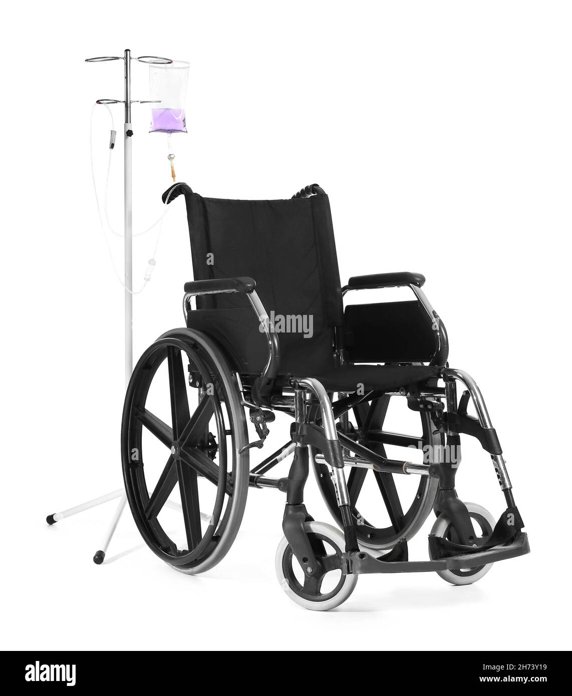 Empty wheelchair and stand for IV drip on white background Stock Photo ...