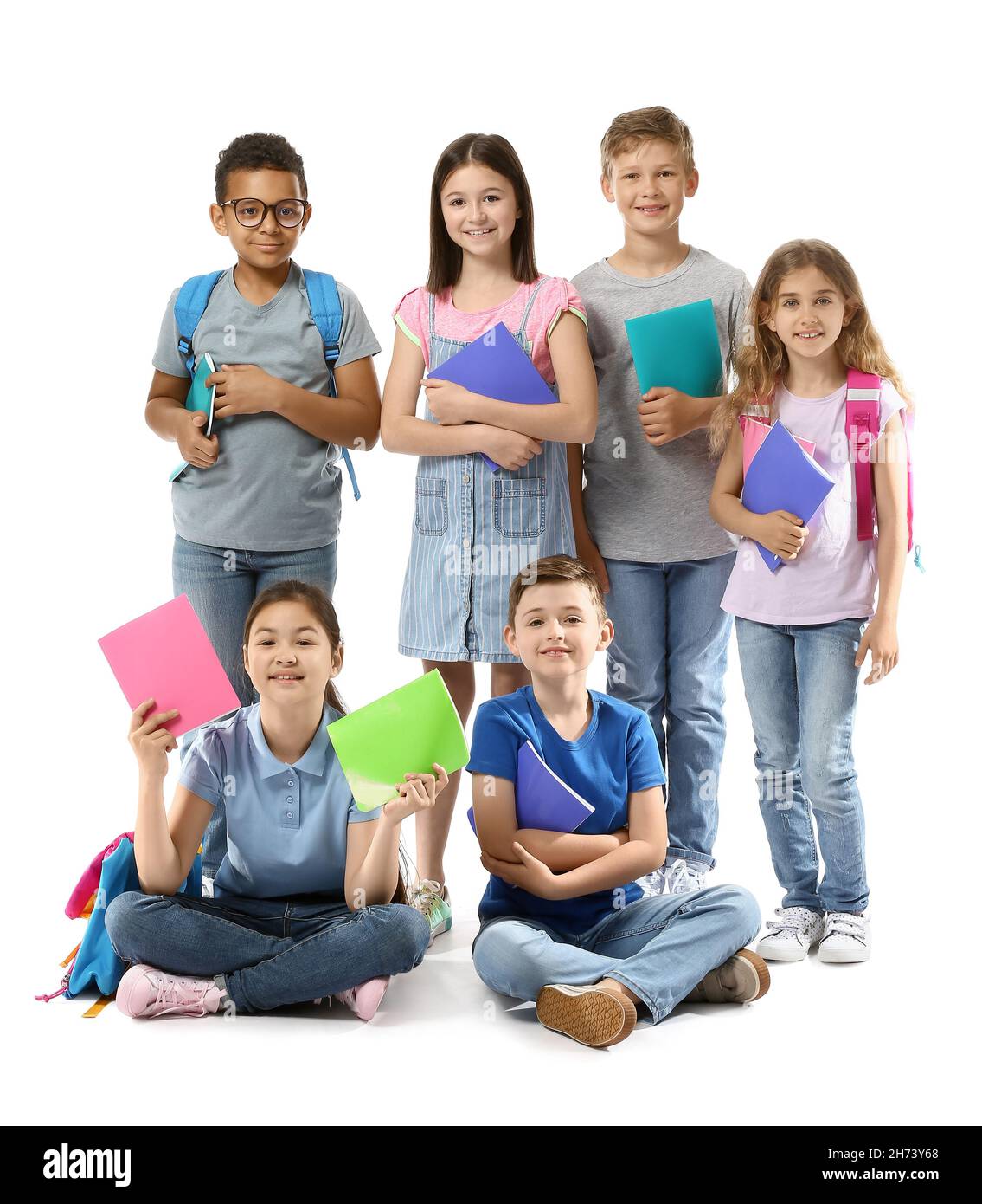 Portrait of little pupils on white background Stock Photo - Alamy