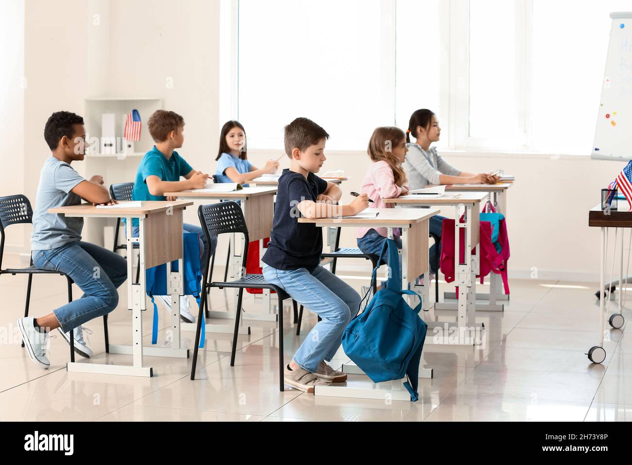 Children taking classes at language school Stock Photo - Alamy