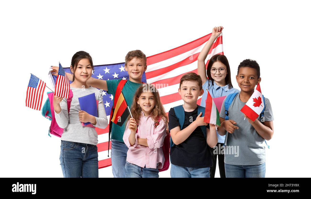 Pupils of language school with different flags on white background ...