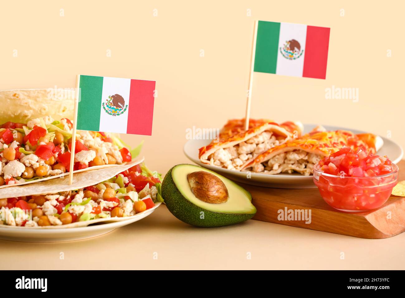 Mexican traditional food decorated with flag on beige background Stock ...