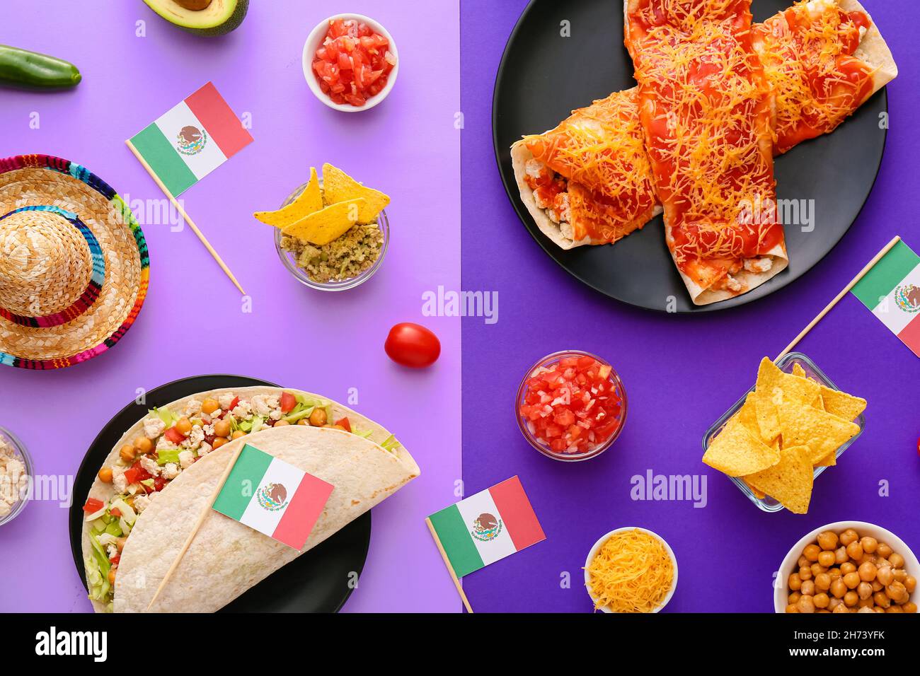 Flat lay with Mexican traditional food on purple background Stock Photo ...