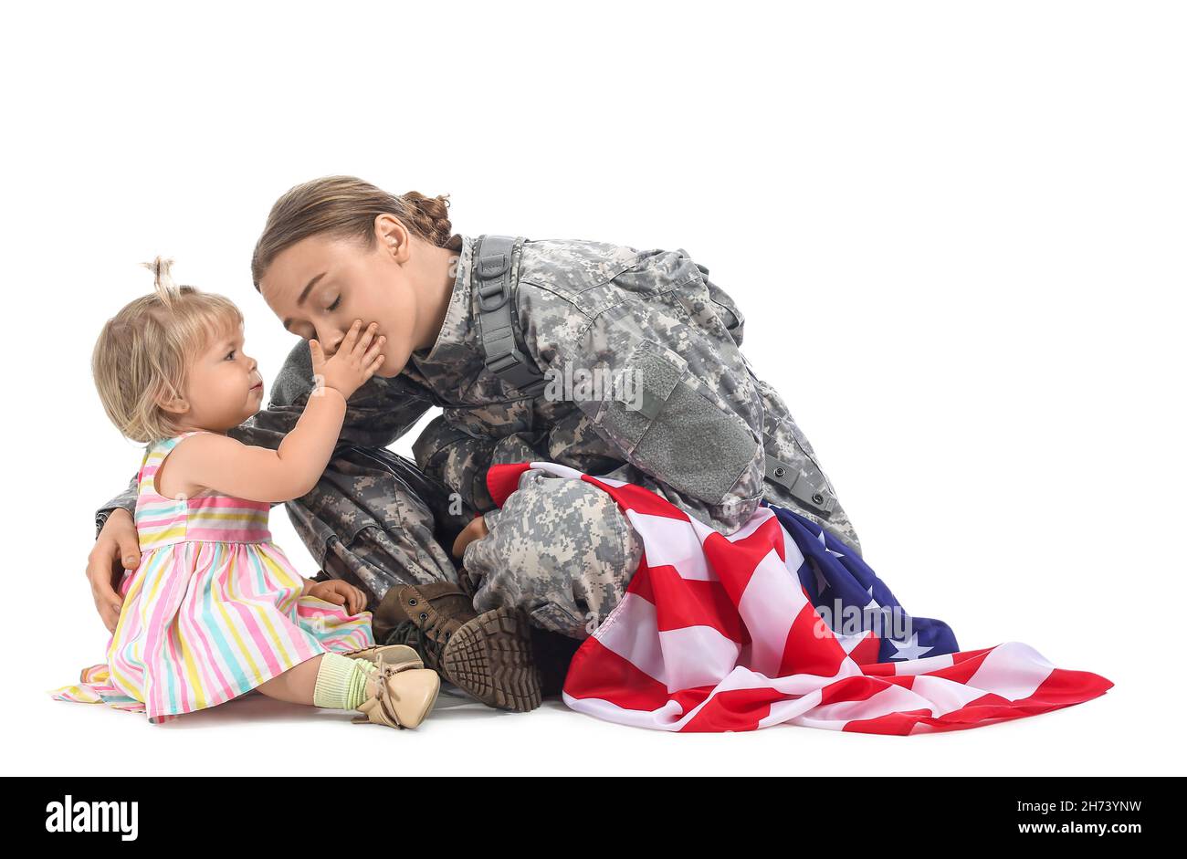 Female soldier with USA flag and her cute baby girl on white background ...
