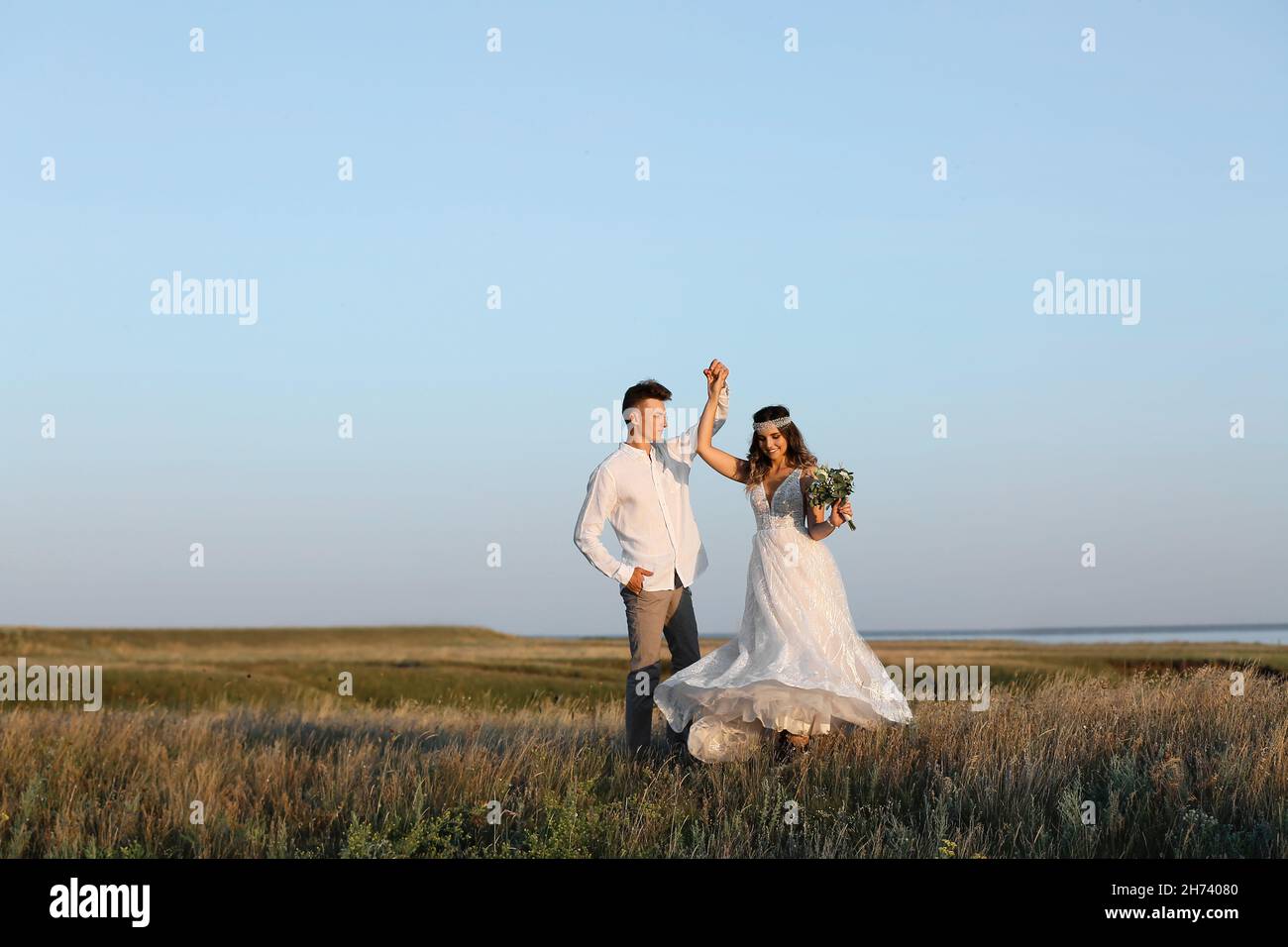 Elegant young woman dancing outdoors hi-res stock photography and ...