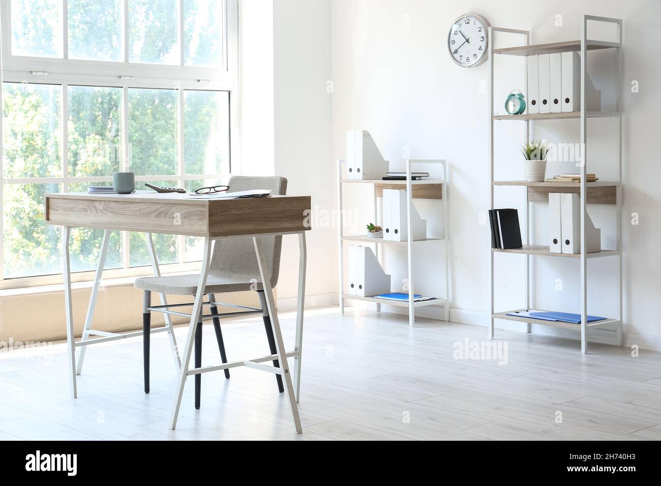 Interior of modern office with comfortable workplace Stock Photo - Alamy