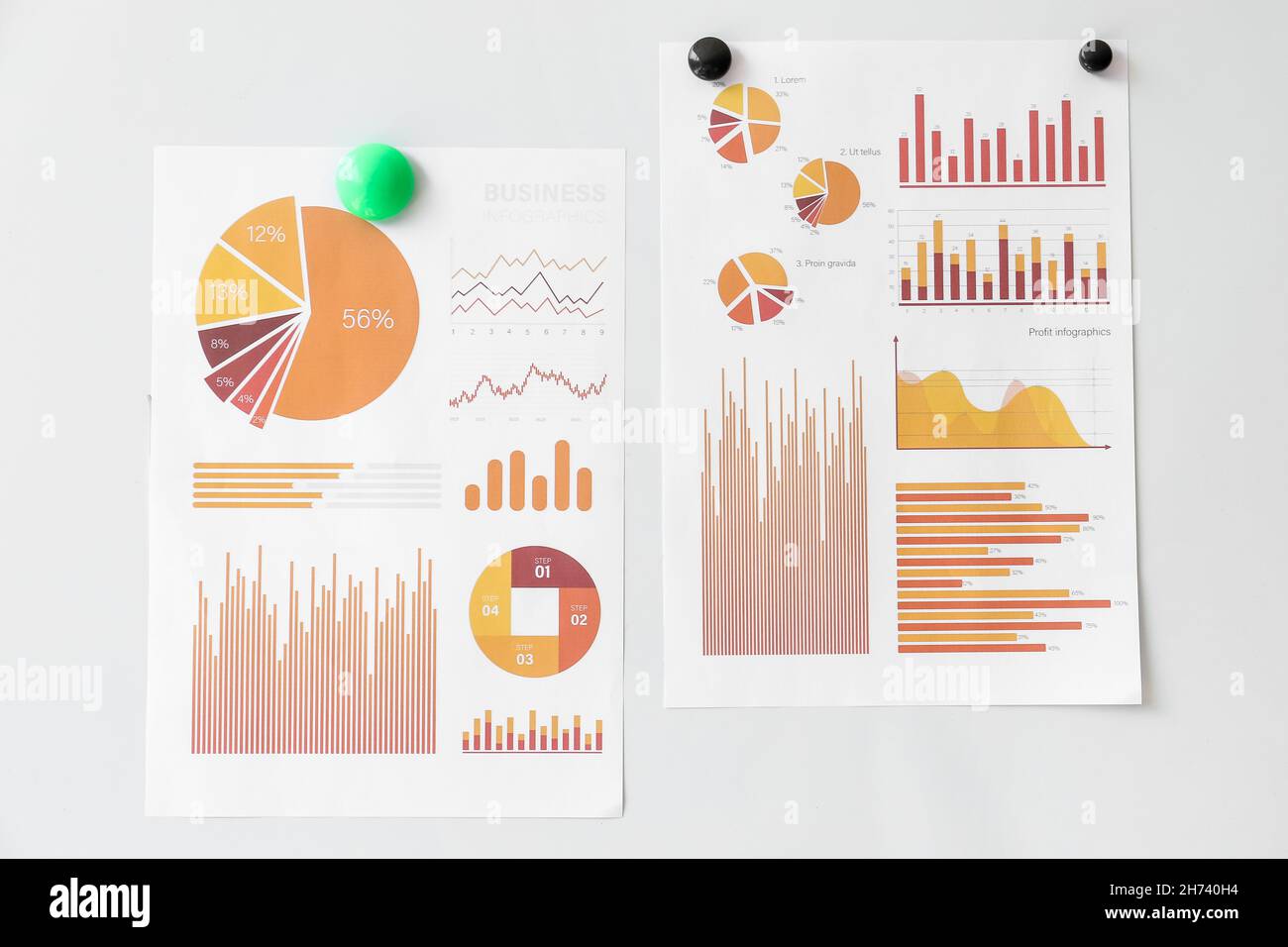 Documents hanging on whiteboard in office Stock Photo - Alamy