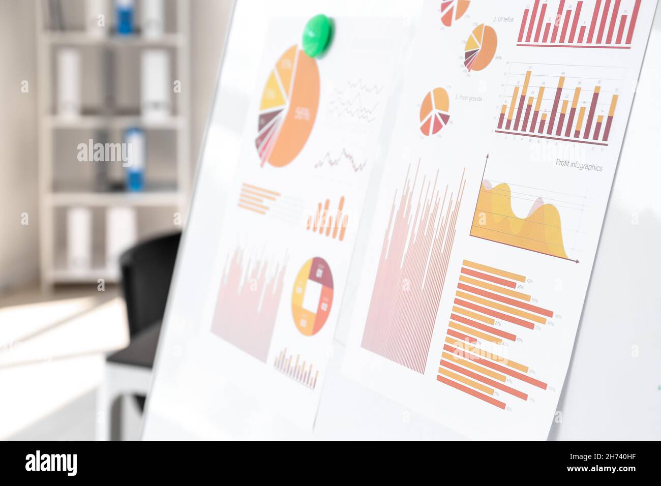 Documents hanging on whiteboard in office Stock Photo - Alamy