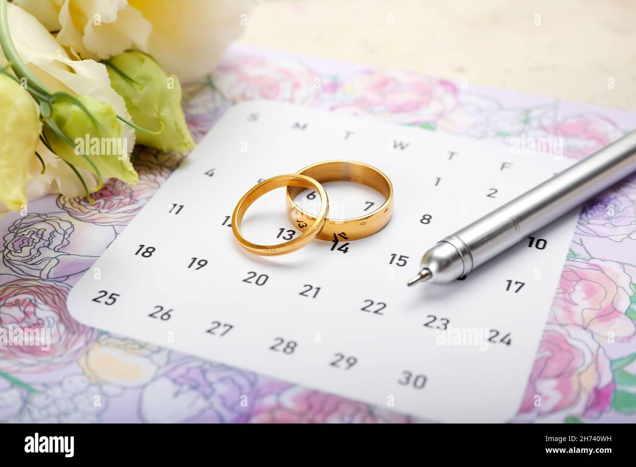 Beautiful composition with wedding calendar on table Stock Photo - Alamy