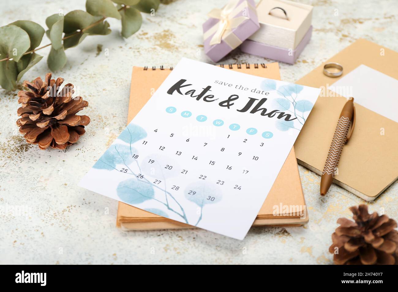 Beautiful composition with wedding calendar on table Stock Photo - Alamy