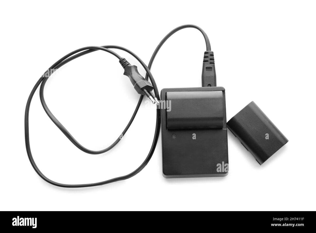Camera batteries and charger isolated on white background Stock Photo ...