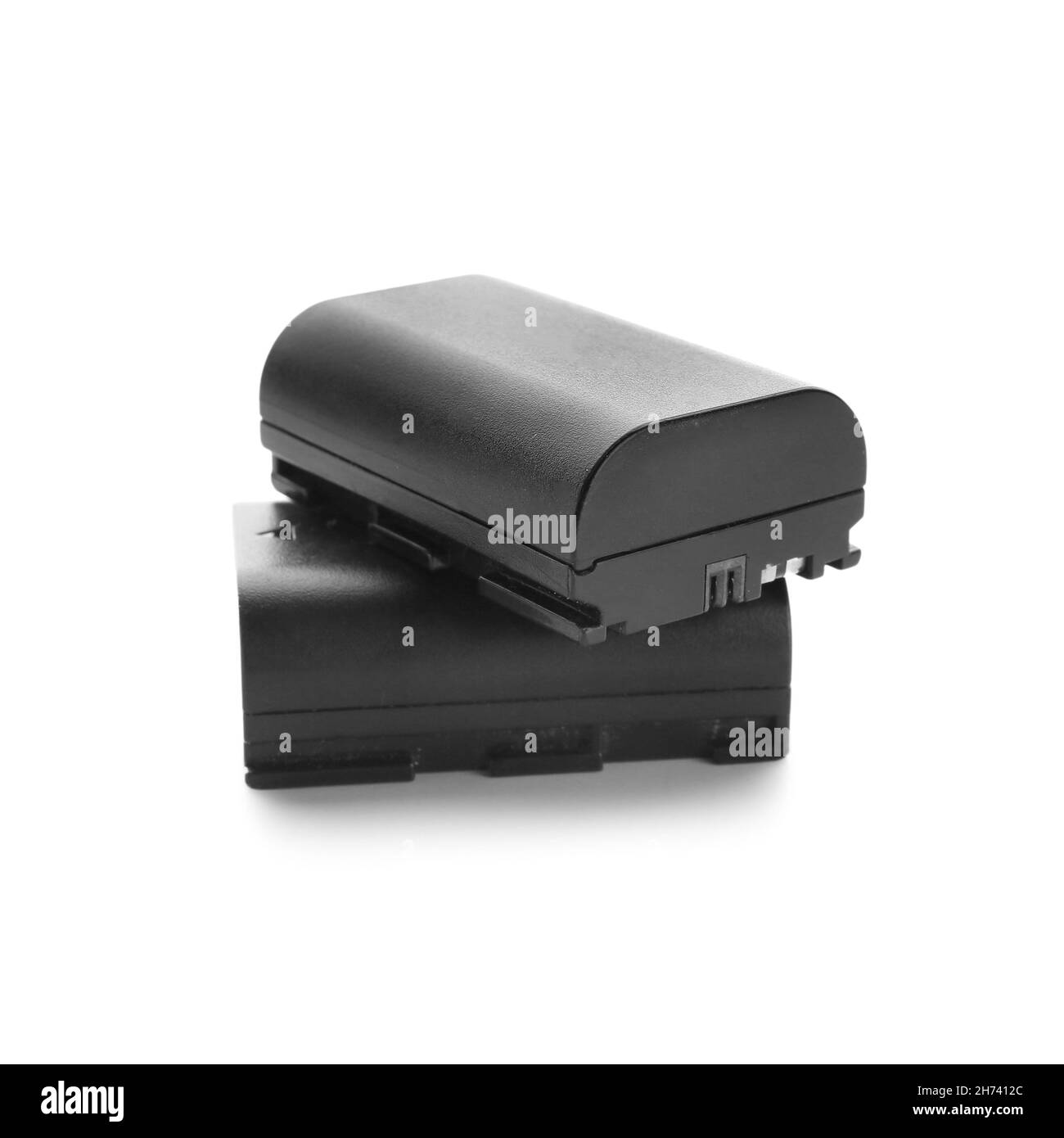 Camera batteries isolated on white background Stock Photo - Alamy