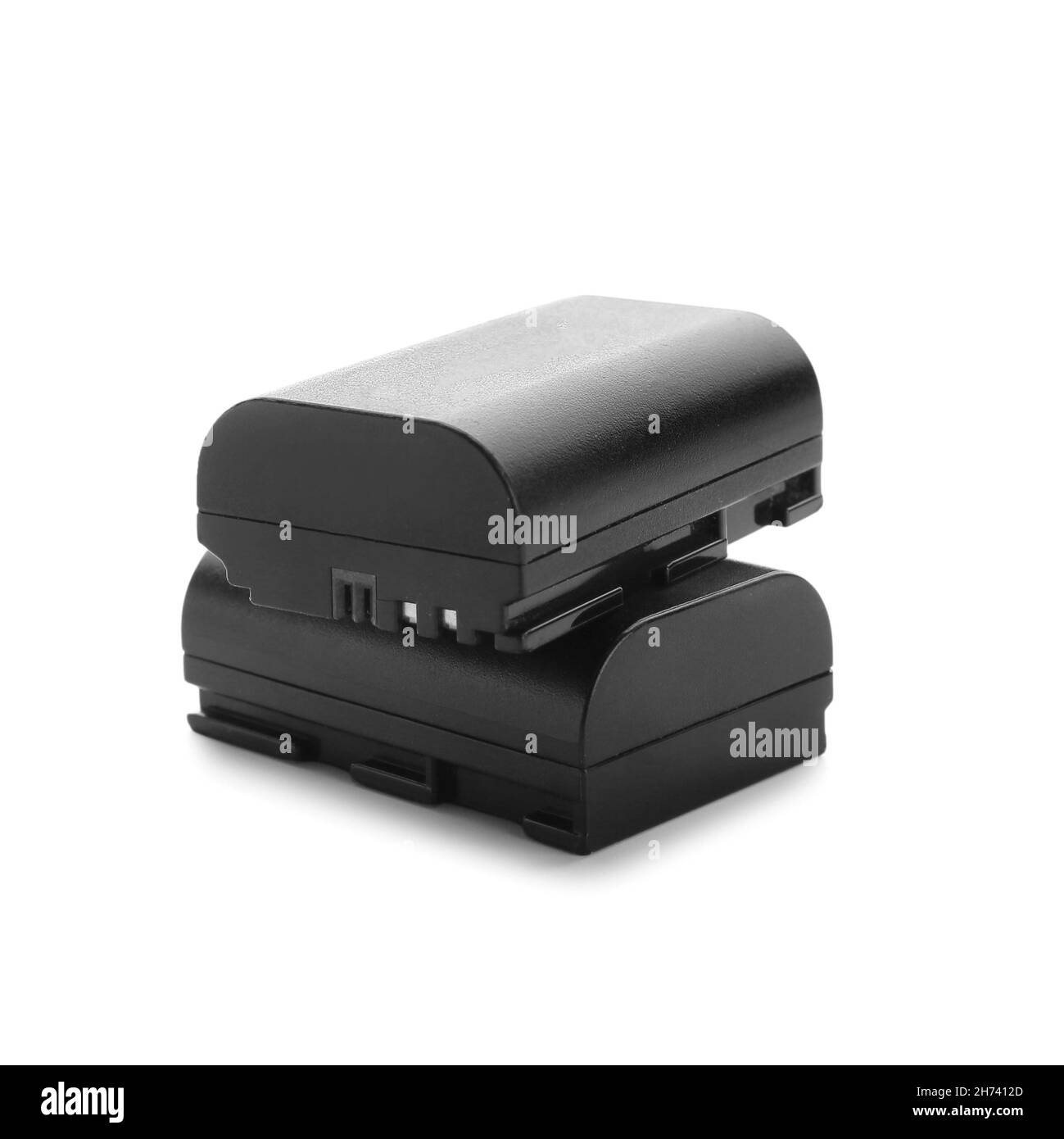 Camera batteries isolated on white background Stock Photo - Alamy
