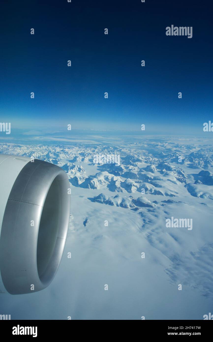 GREENLAND - 10 MAY 2018: View from the aircraft window of the engine of ...