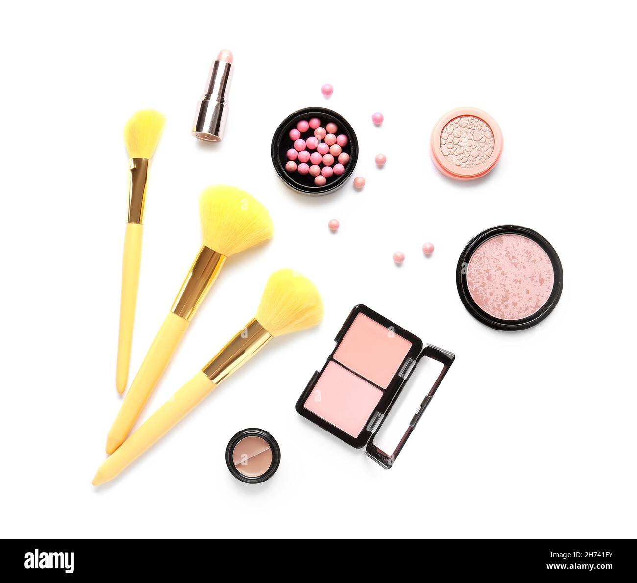 Set of decorative cosmetics with makeup brushes on white background ...