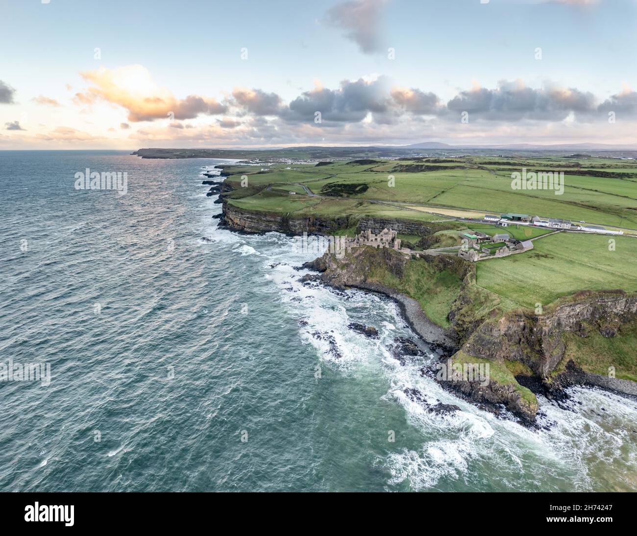 The north coast by Dunluce Castle, County Antrim, Northern Ireland ...
