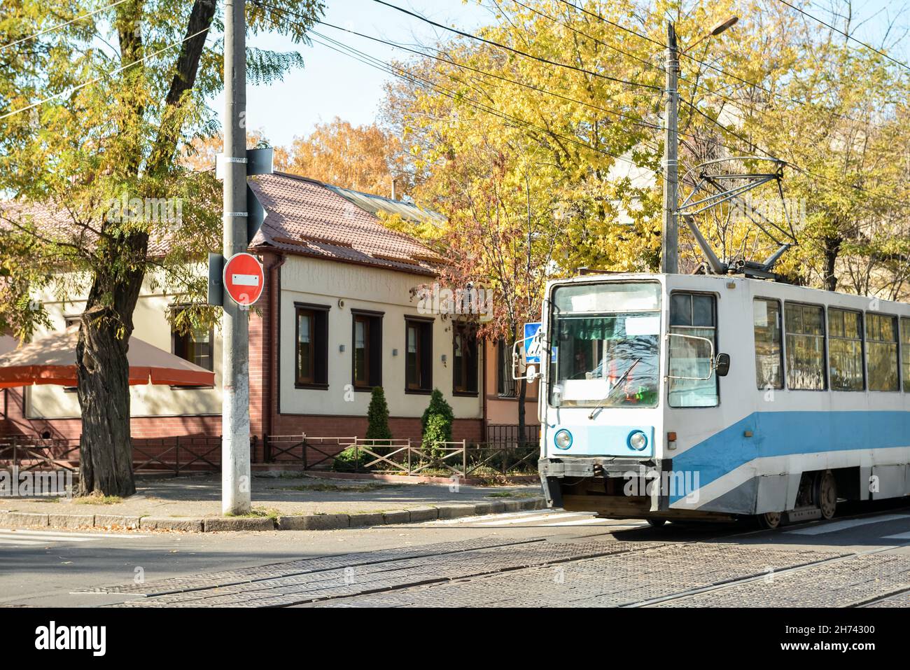 Old tram on city street Stock Photo - Alamy