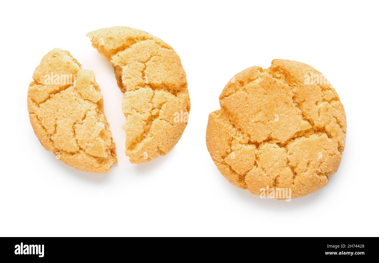 Delicious broken cookies on white background Stock Photo - Alamy