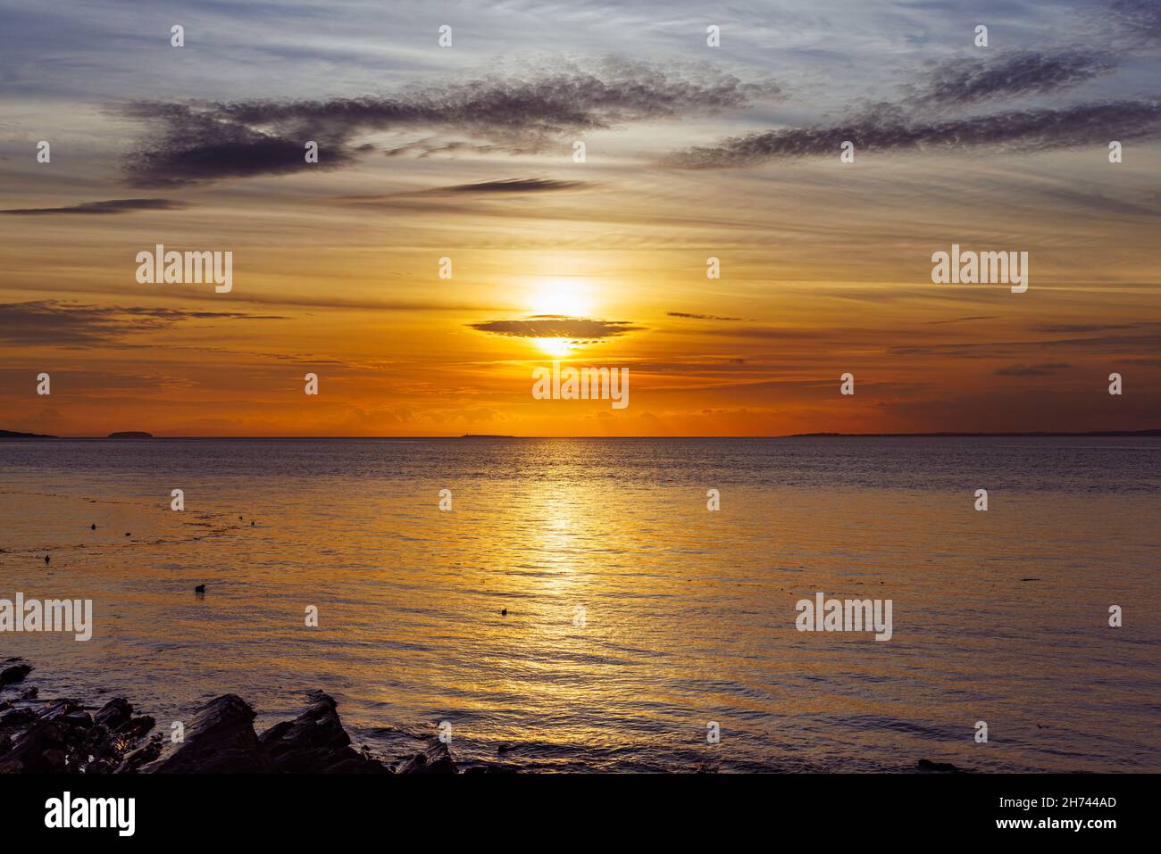 Sunset over the Bristol channel Stock Photo - Alamy