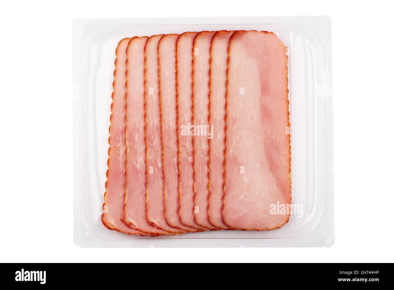 top view of rectangular square slices of smoked pork loin ham in ...