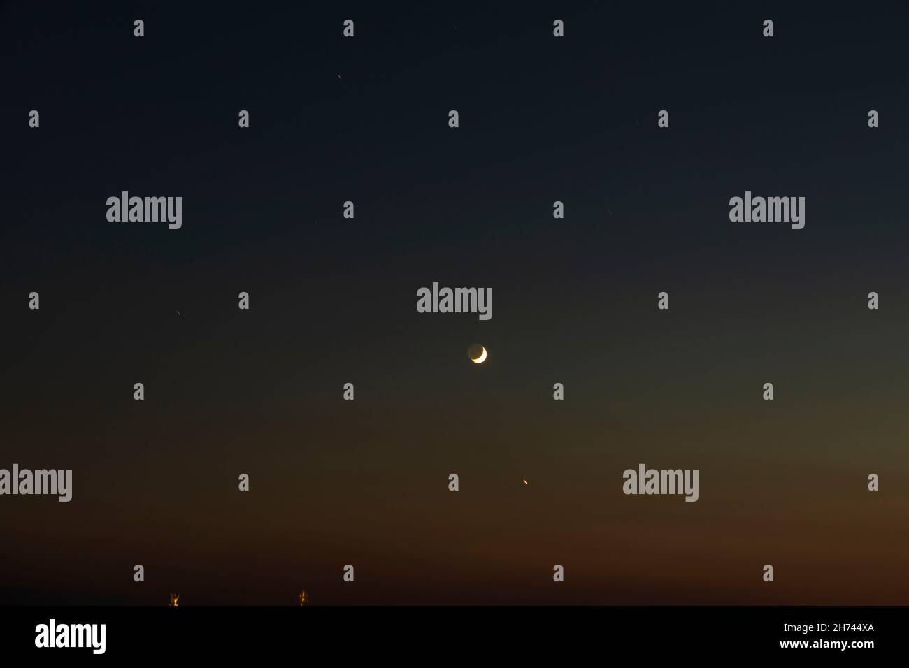Crescent moon sunset clouds on hi-res stock photography and images - Alamy