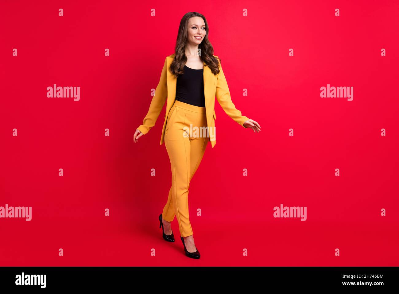 Full length photo of happy charming nice young woman look go empty ...