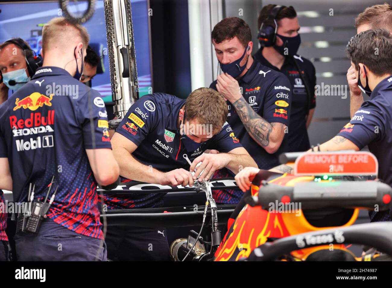 Doha, Qatar. 20th Nov, 2021. Red Bull Racing mechanics work on ...