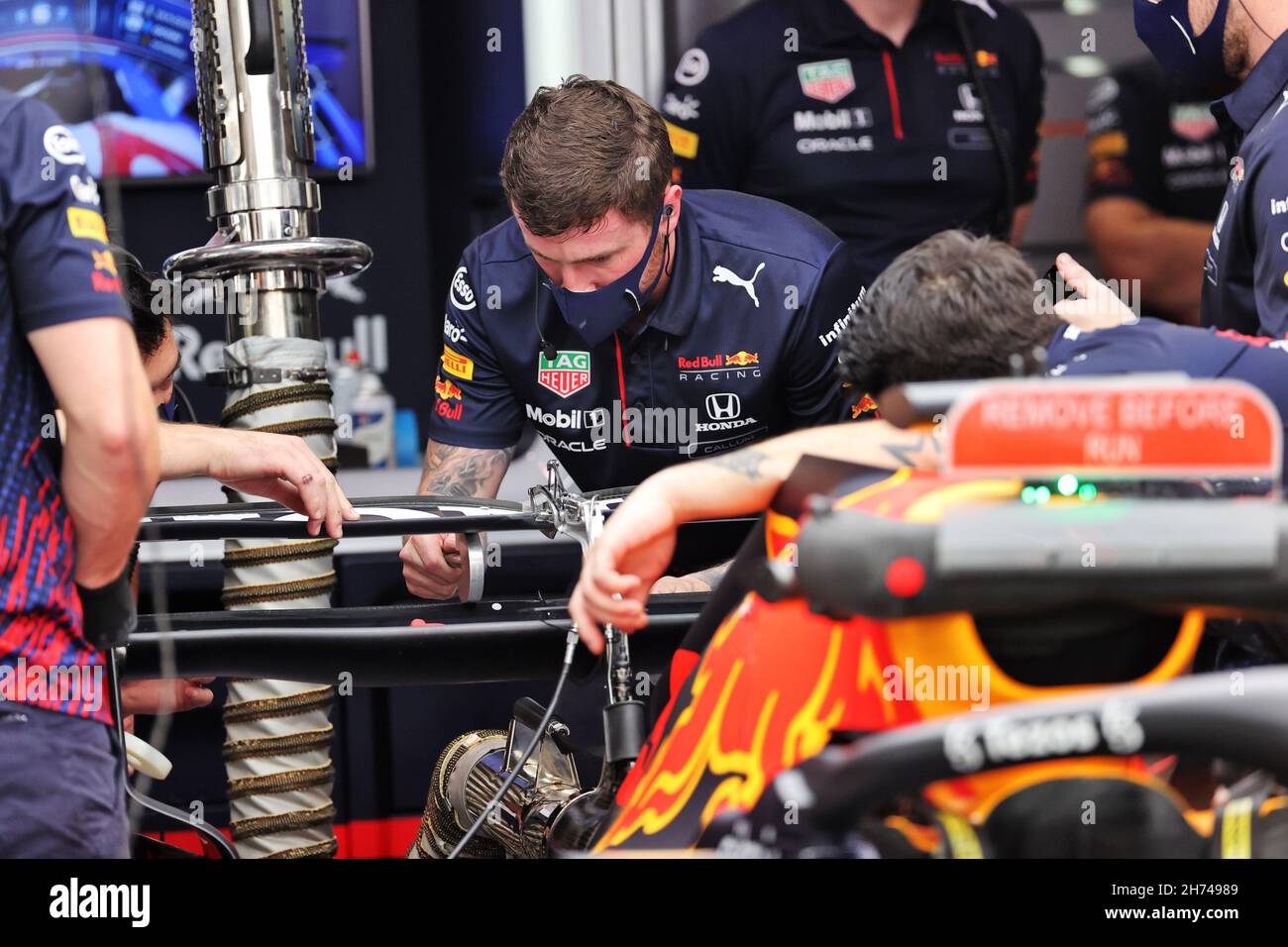 Doha, Qatar. 20th Nov, 2021. Red Bull Racing mechanics work on ...