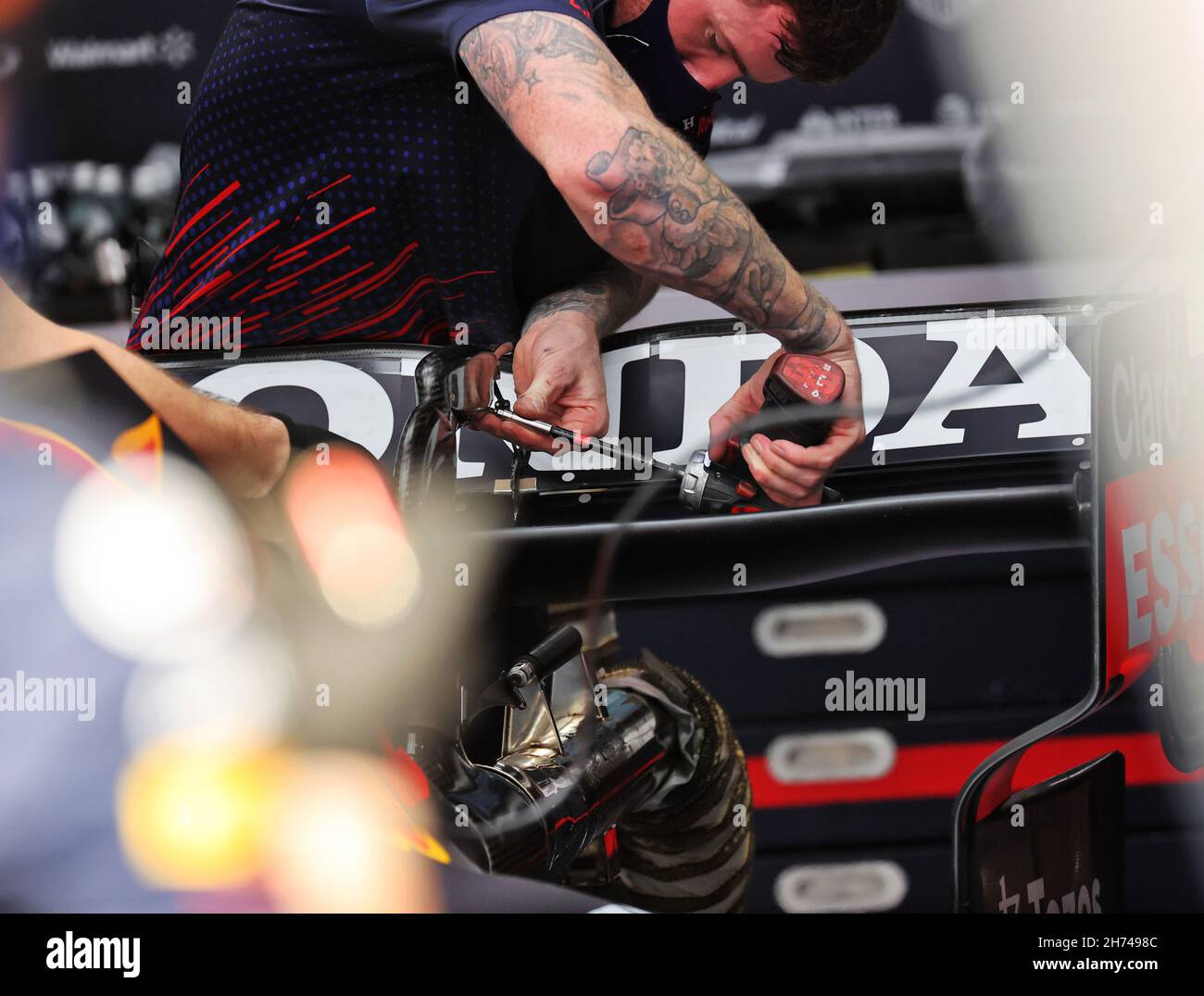 Doha, Qatar. 20th Nov, 2021. Red Bull Racing mechanics work on ...