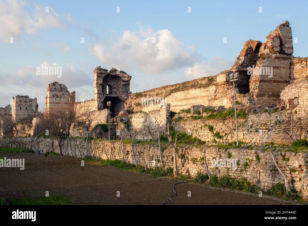 View of historical Istanbul walls and vegetable field Stock Photo - Alamy