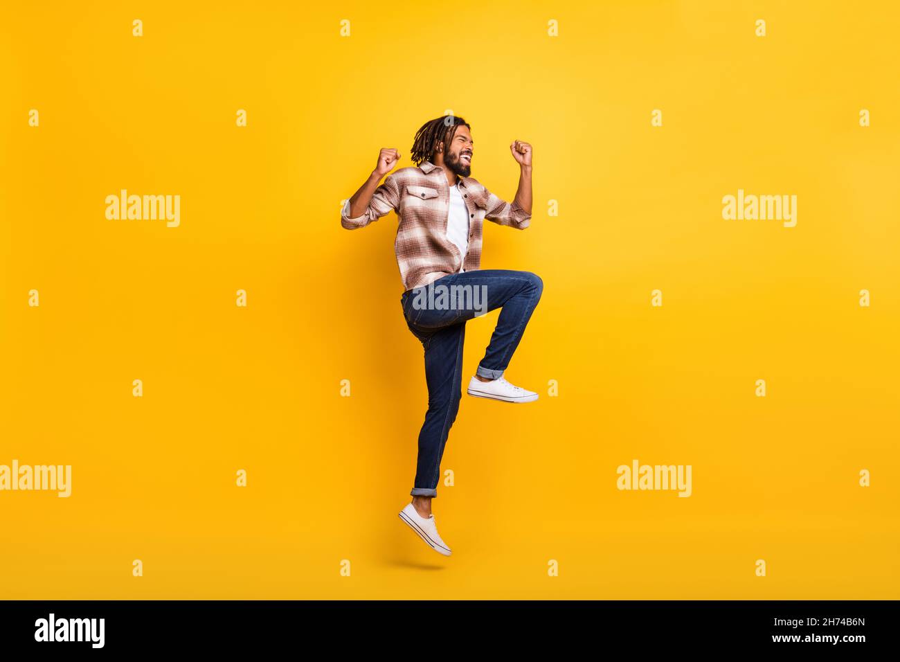 Full length body size photo of man jumping high gesturing like lottery ...