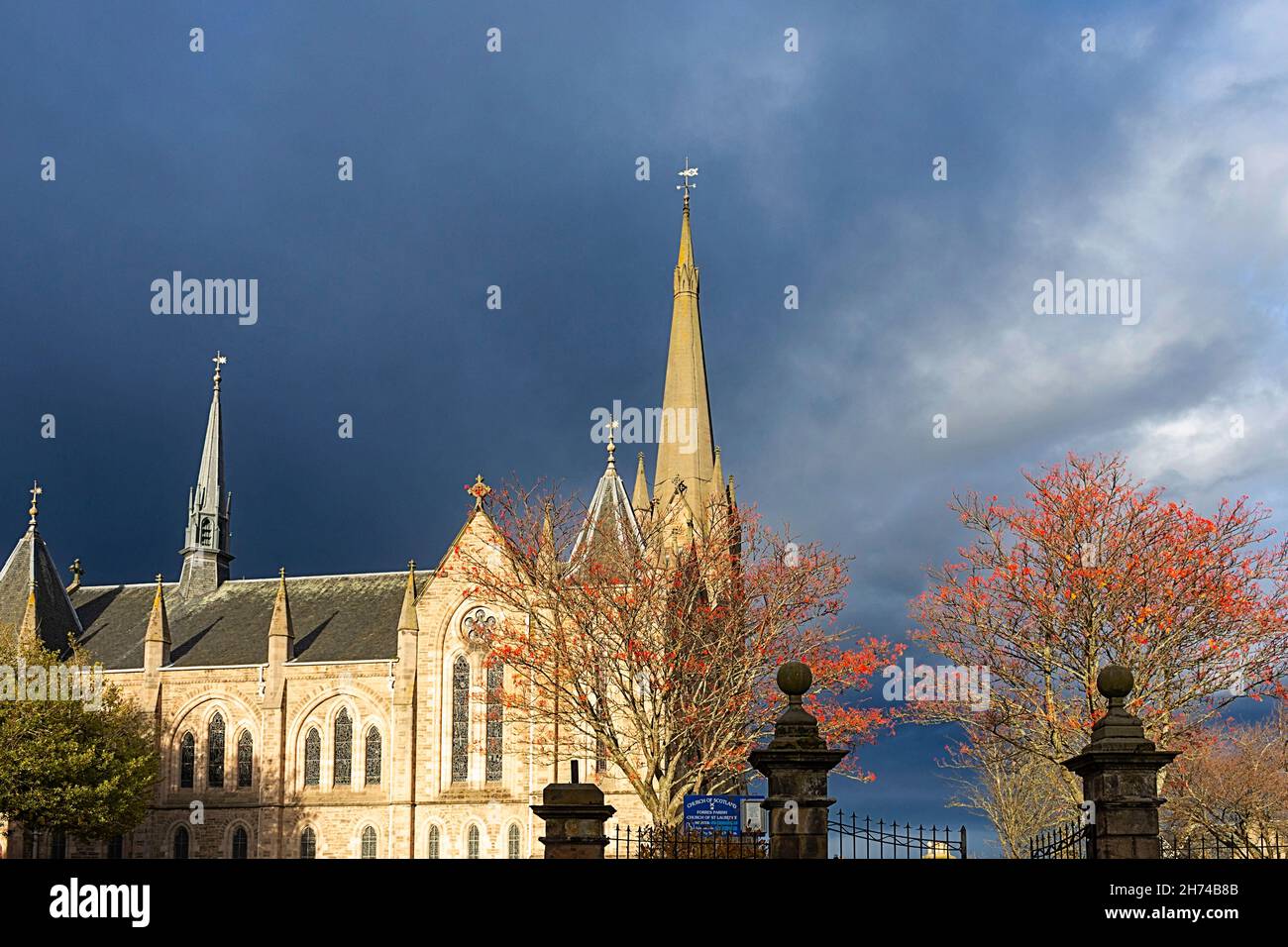 FORRES MORAY SCOTLAND THE CHURCH OF ST LAURENCE AND RED ROWAN BERRIES ...