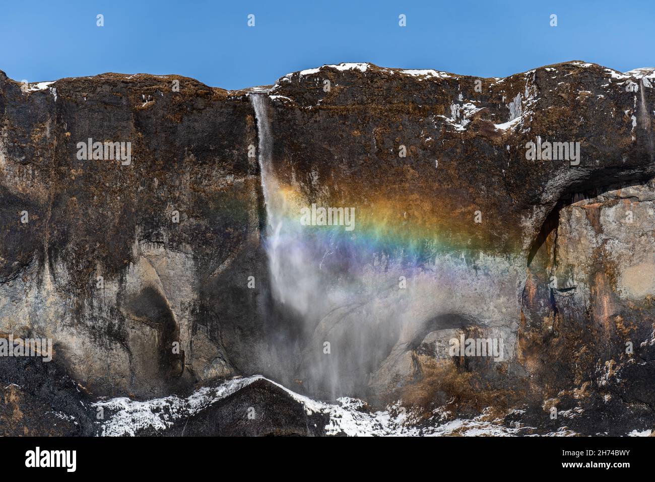 Photo of an icelandic waterfall in Iceland with a rainbow Stock Photo ...