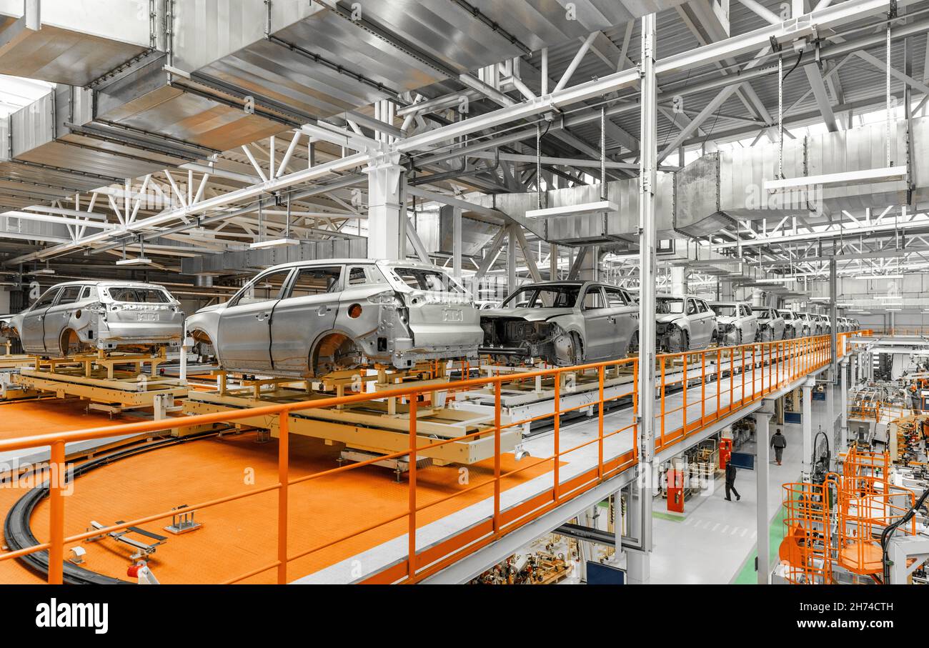 Automobile production line. Welding car body. Modern car assembly plant ...
