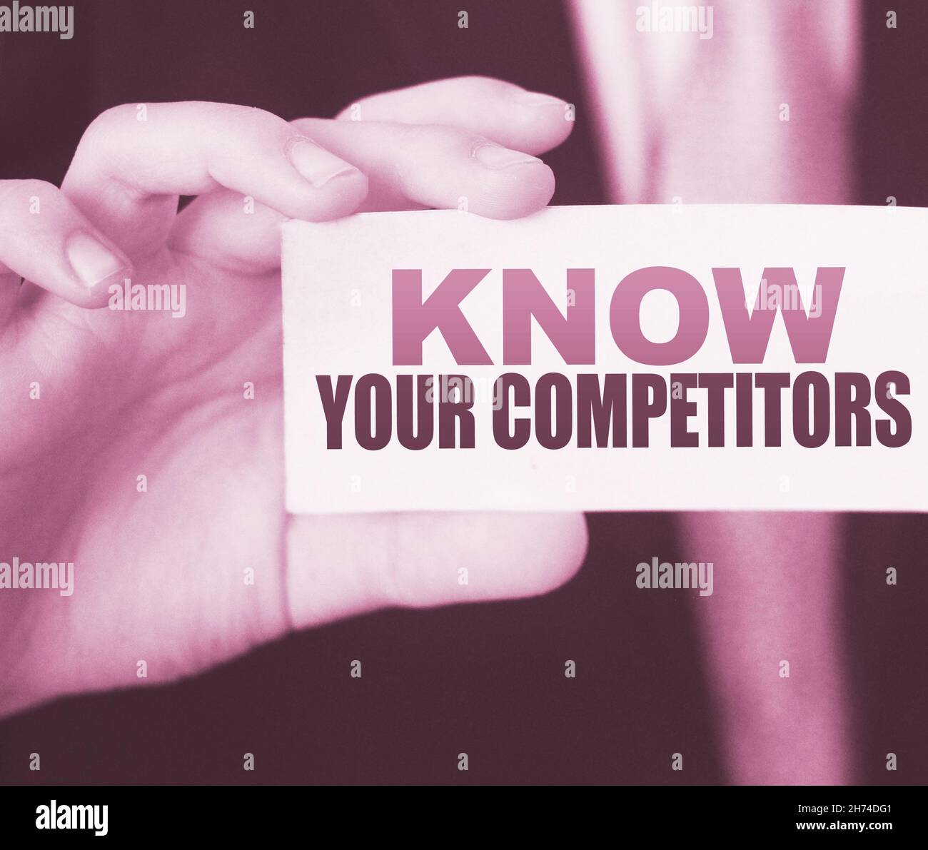 Businessman putting a card with text know your competitors. Business ...