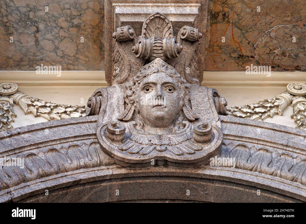 Decorative face sculpture on facade Stock Photo - Alamy