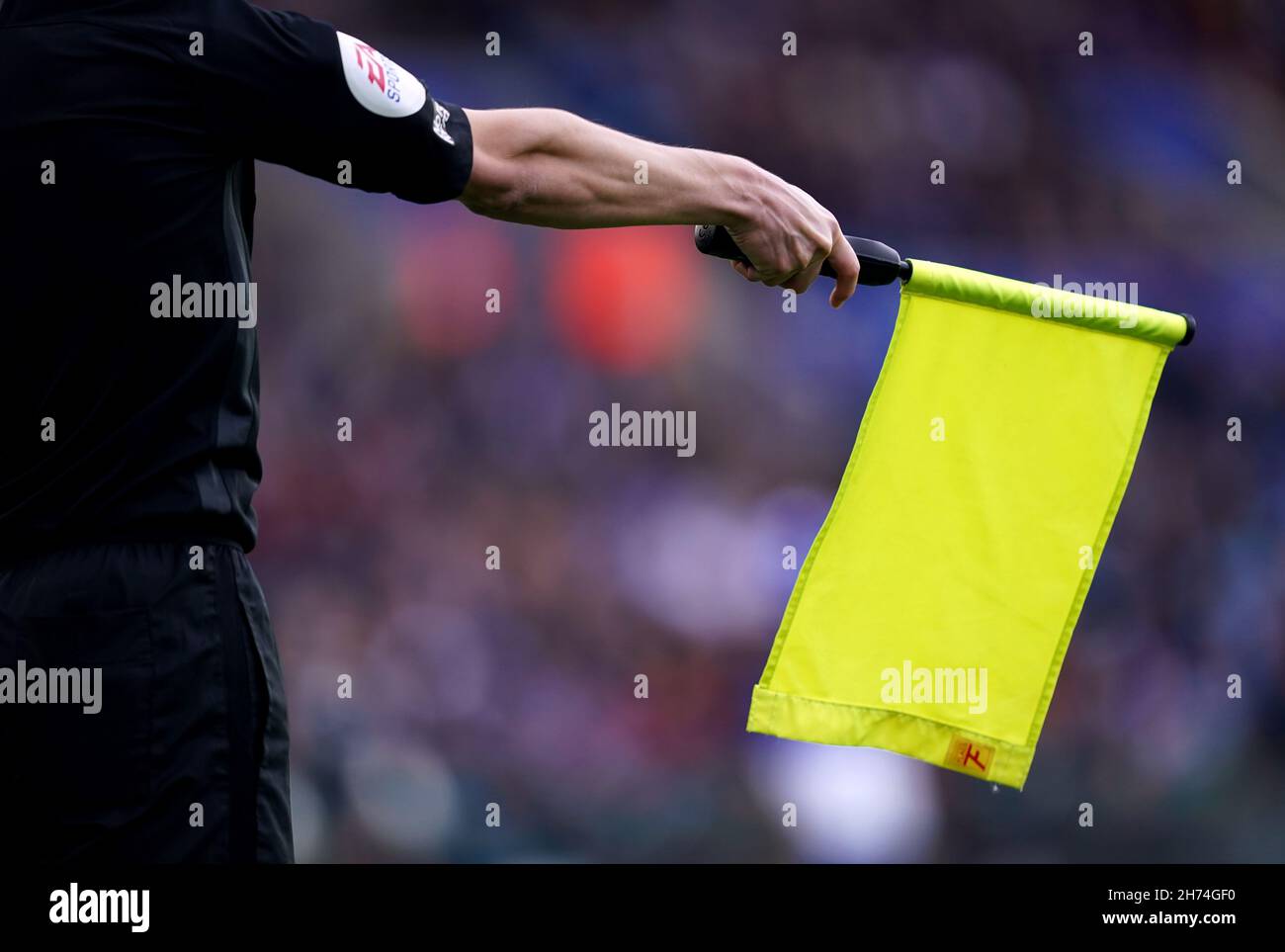 The assistant referee flags for offside during the Premier League match ...