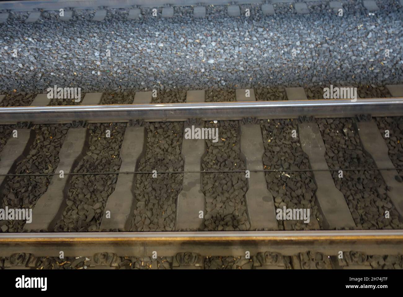 Grey Railway tracks as a close up Stock Photo - Alamy