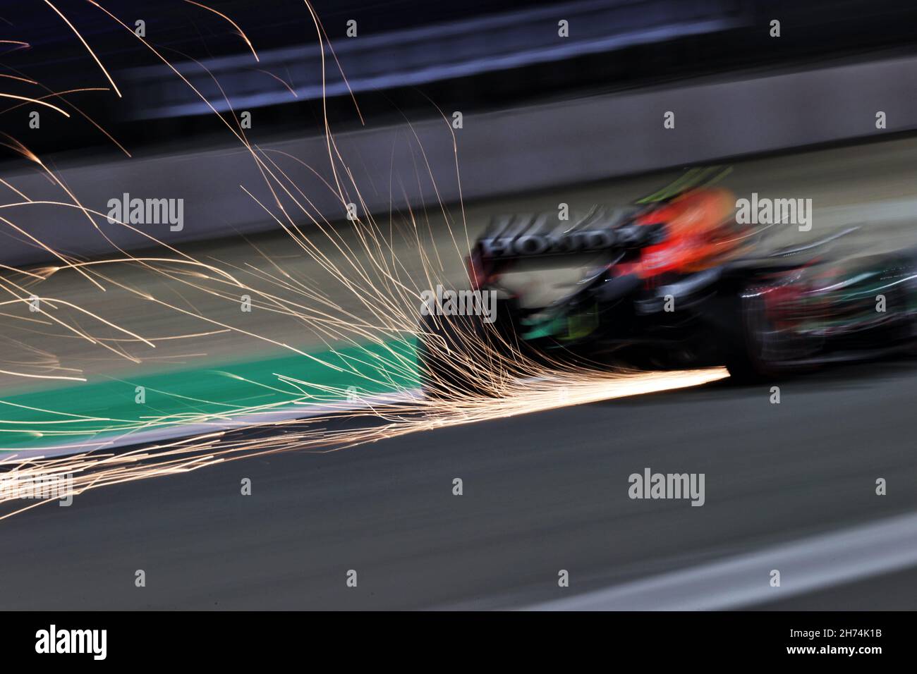 Sergio Perez (MEX) Red Bull Racing RB16B sends sparks flying. Qatar ...