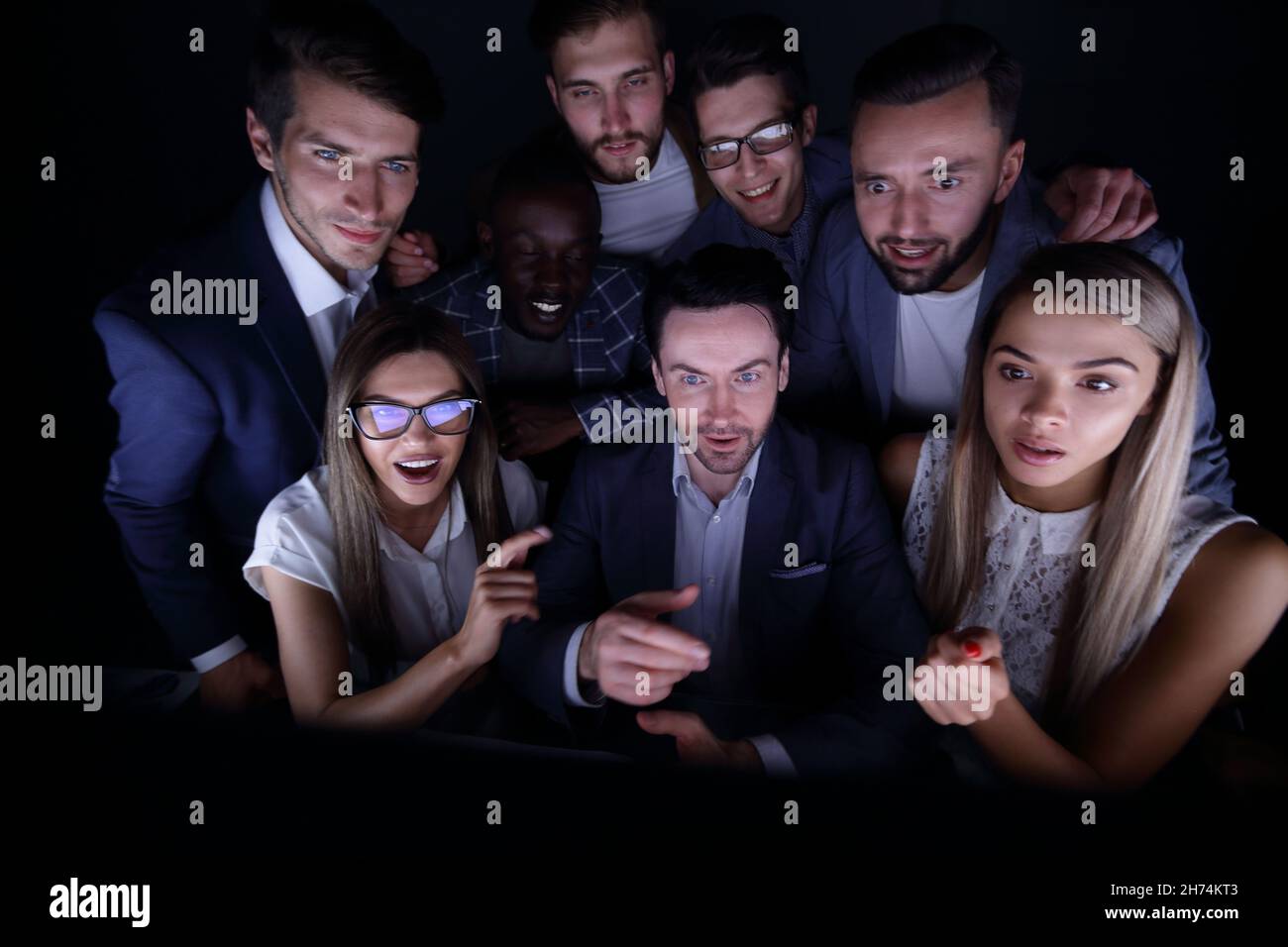 corporate team of employees looking at the computer screen Stock Photo ...