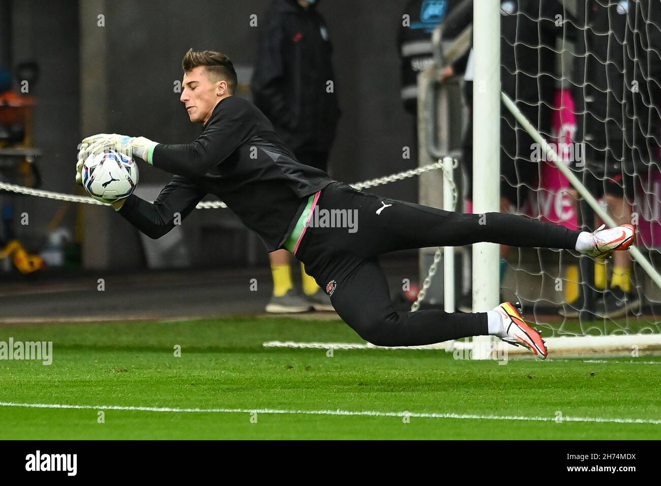Stuart Moore #13 of Blackpool makes a save during the pre-game warmup ...