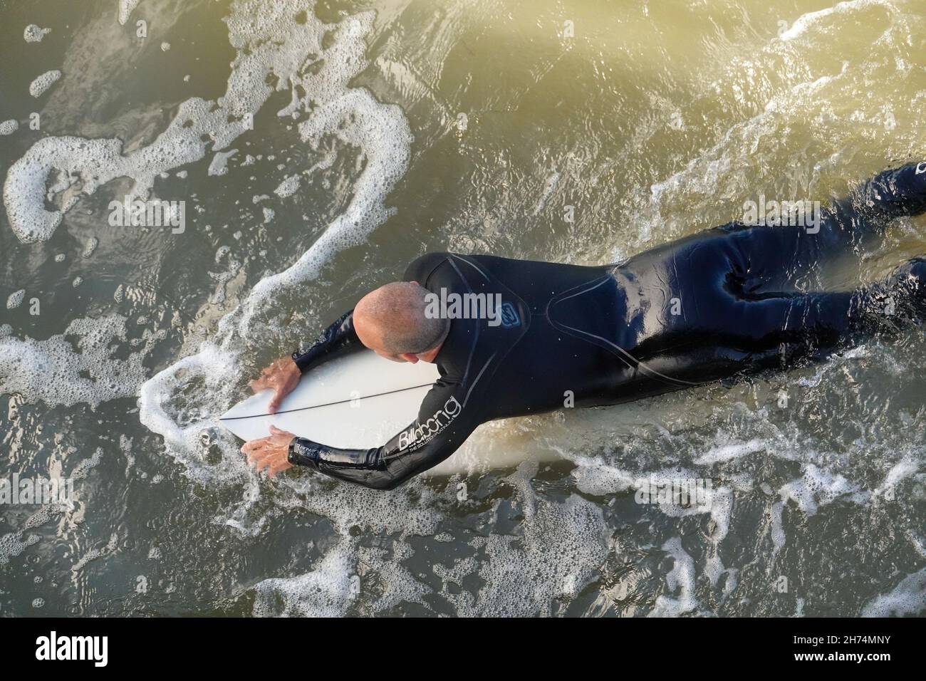 Surfer laying on board hi-res stock photography and images - Alamy