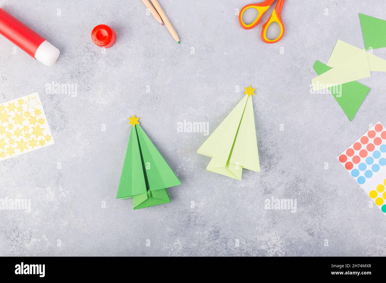 Two paper tree origami. Christmas paper collage. Made with his own ...