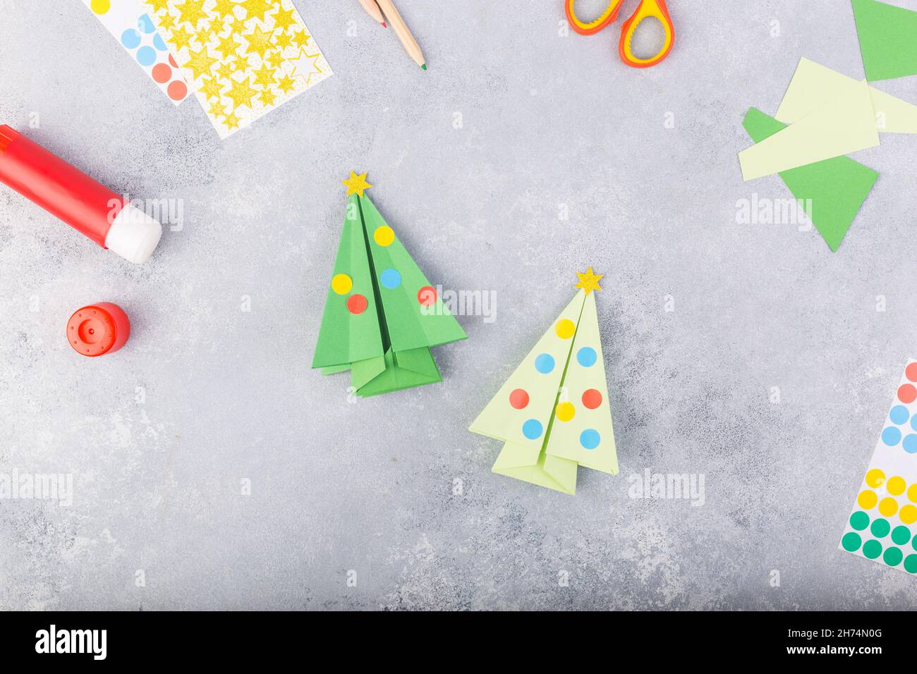 Two paper tree origami. Christmas paper collage. Made with his own ...