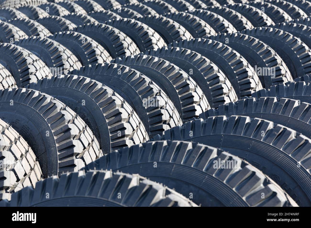 Photo of black big tires on wheels for large cars Stock Photo - Alamy