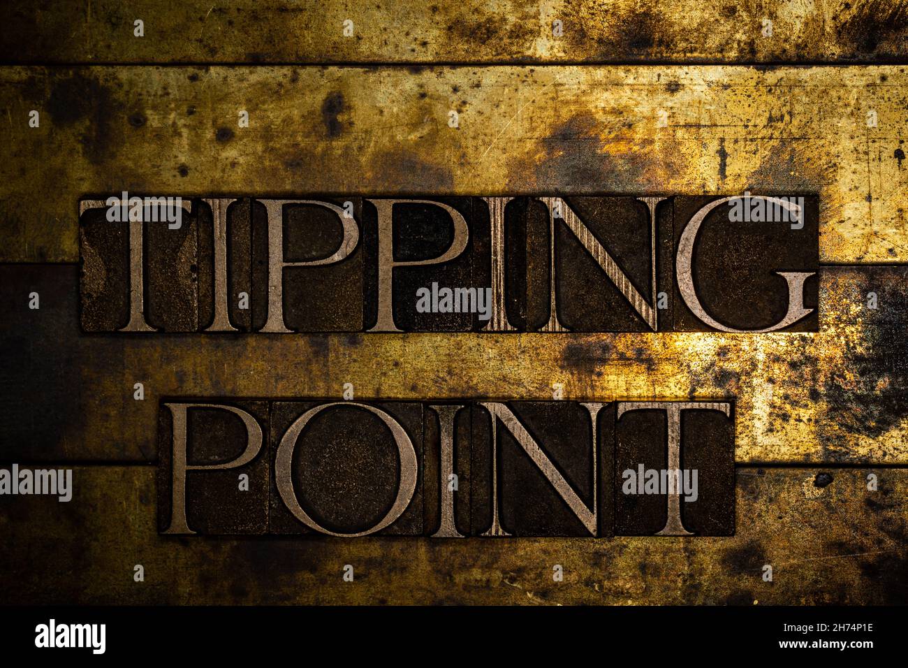 Tipping Point text message on textured grunge copper and vintage gold ...