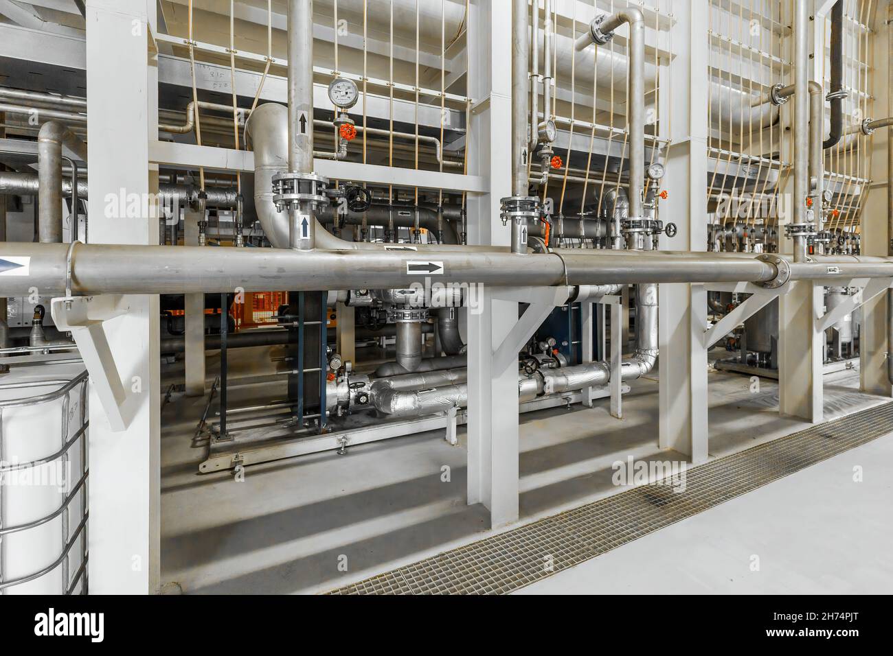 Photo of pipes and tanks. Chemistry and medicine production ...